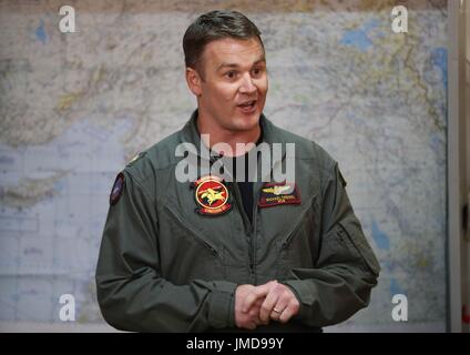 Pilot Michael Tremel chats with members of the media onboard the US ...