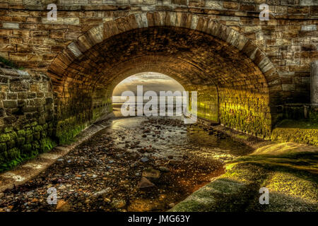 The bridge over the beck at Sandsend Stock Photo - Alamy