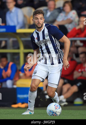 Jay Rodriguez of West Bromwich Albion tussles with Axel Tuanzebe of ...