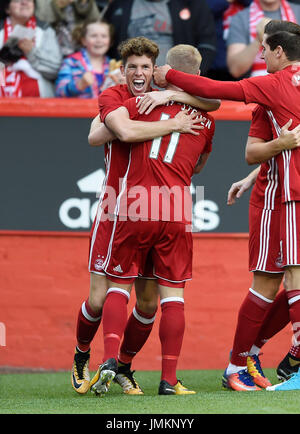 Aberdeen's Ryan Christie (left) celebrates with team mate Greg Tansey ...