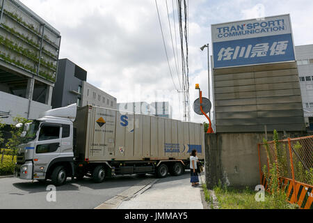 A Sagawa Express delivery truck leaves the Sagawa headquarters on July ...
