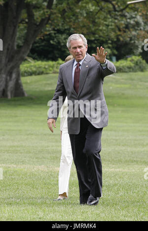 President George Bush is greeted by his dog Ranger at the White House ...