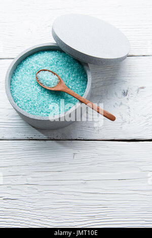 Turquoise sea salt in cup Stock Photo - Alamy