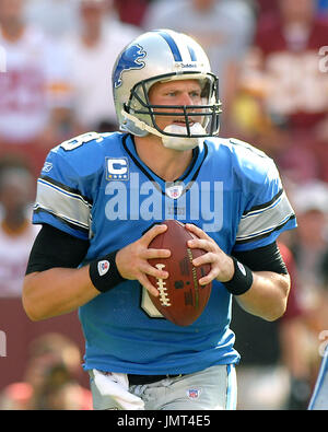 Detroit Lions quarterback Jon Kitna with family, clockwise from top ...