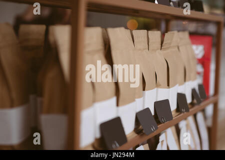 Paper bags with coffee cup on desk in office. Food delivery service ...