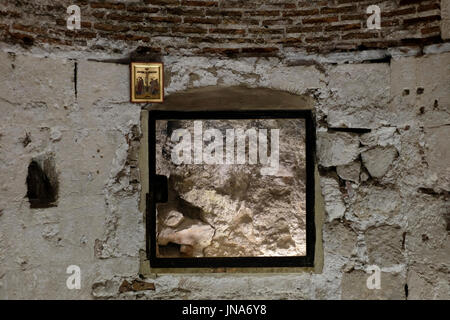 Glass covers the cracked Rock of Calvary which according to earliest ...