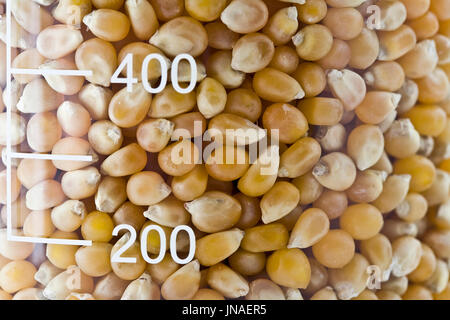 Flask filled with corn Stock Photo - Alamy