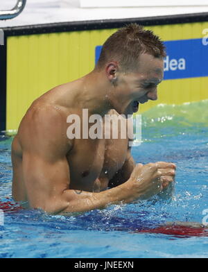 United States' Caeleb Remel Dressel celebrates after winning the gold ...