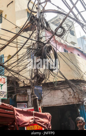 A tangle of utility wires and cables above the streets in Chandni Chowk ...