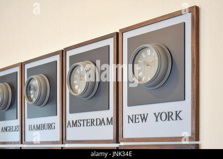 Clocks showing various world city times outside the Tourneau Store ...