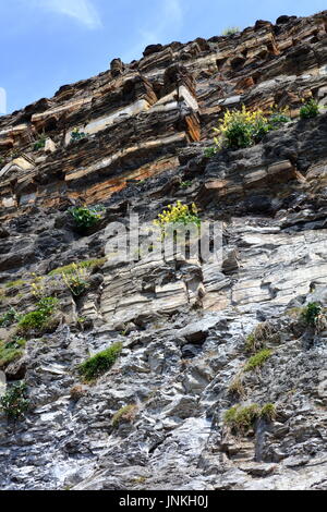 Geological cliff structures with limestone and soft crumbling oil ...
