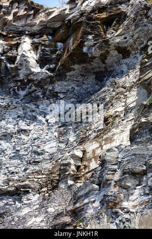 Geological cliff structures with limestone and soft crumbling oil ...