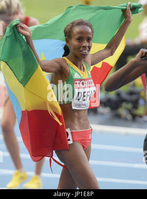 Meseret Defar of Ethiopia celebrates winning the Women's 500M gold ...