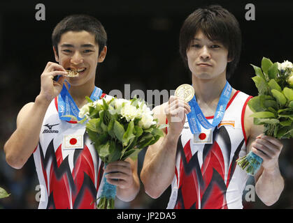 Japan's Kenzo Shirai, bronze winner, embraces North Korea's Ri Se Gwang ...