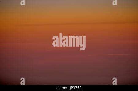 Flying the friendly skies during a sunset is an awesome experience of ...