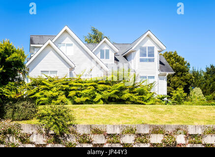 House for upper middle class during sunny day Stock Photo - Alamy