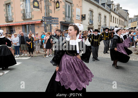 Brittany France - women in traditional costume and hats parading in ...