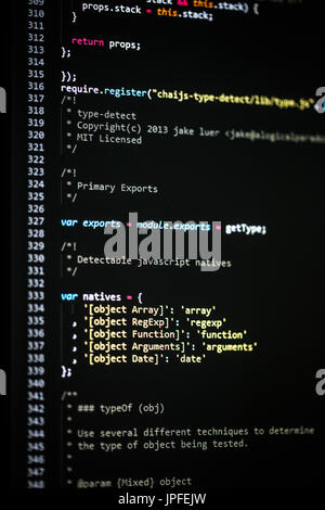 Software programer typing source code on computer keyboard, developing firewall server and cloud ...