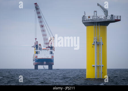 The jack-up vessel, Aeolus, installing the Transition Pieces (TP's) on ...