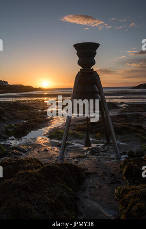 St Patrick's tide bell on the beach in Cemaes Bay, Isle of Anglesey ...