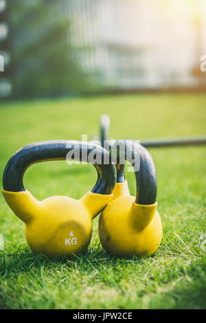 yellow weights 4kg Stock Photo - Alamy