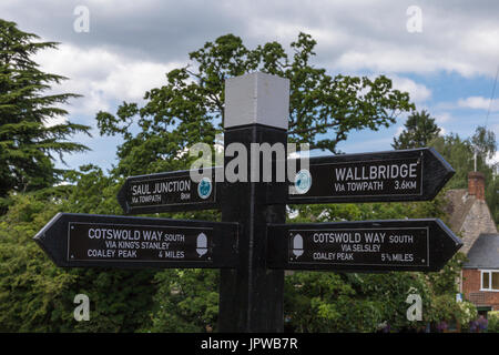 Signpost on the Cotswold Way as it passes over the Stroudwater Canal ...