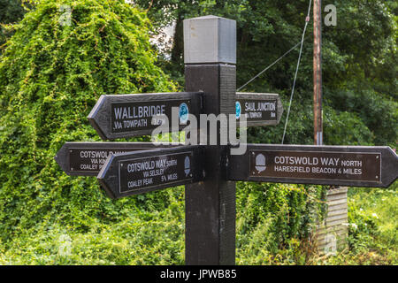 Signpost on the Cotswold Way as it passes over the Stroudwater Canal ...