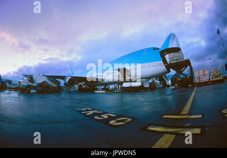 Boeing 747-200F with nose cargo loading door opening at dawn Stock ...