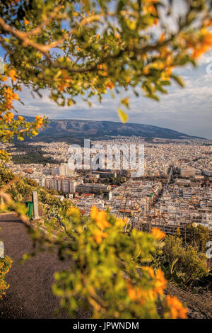 Large city of Athens with spring trees in Greece Stock Photo - Alamy