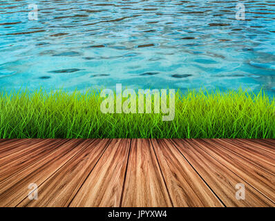 waterside with wooden floor with green grass and water background Stock ...