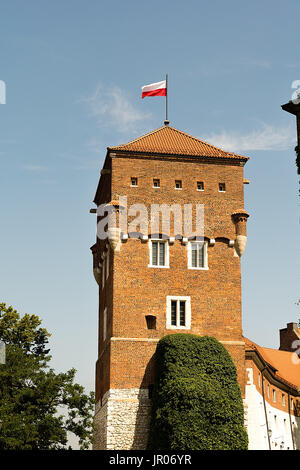 Wawel castle tower with the Polish flag in Krakow Stock Photo - Alamy