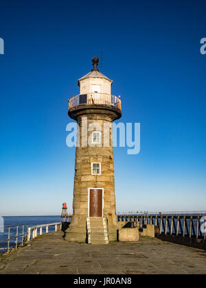 Whitby Lighthouse and Pier Stock Photo - Alamy