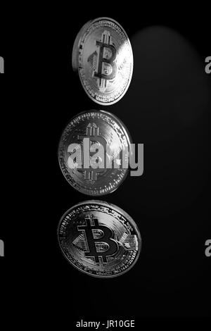 Virtual coins bitcoins collection on black background Stock Photo - Alamy