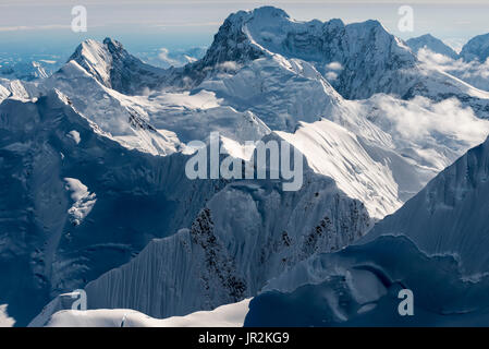 Aerial view of Moose's Tooth and the Alaska Range on a sunny day in ...