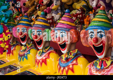 Fun fair clown at side show alley Stock Photo - Alamy