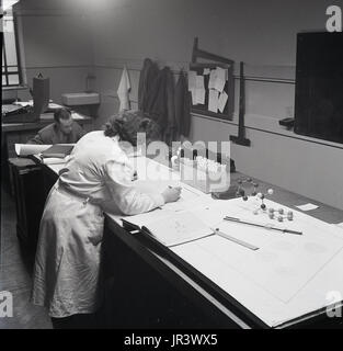 1950s, historical, male and female lab technicians in white coats ...