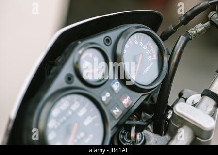 Vintage motorcycle rev counter and speedometer after rain Stock Photo ...