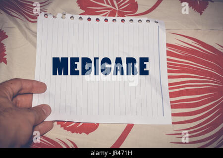 medicare written on white paper, health concept background Stock Photo ...