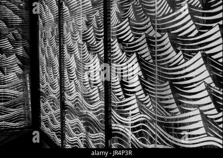 Bus Stop interior with wave patterns on glass visual art Stock Photo ...