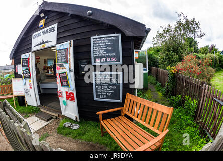 Meat for sale from a wooden shed, Orford, Suffolk, England Stock Photo ...