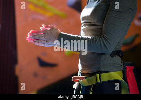 Mid section of woman rubbing powder on hands Stock Photo - Alamy