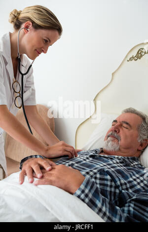 Sleeping doctor. Female doctor sleeping in a hospital rest room Stock ...
