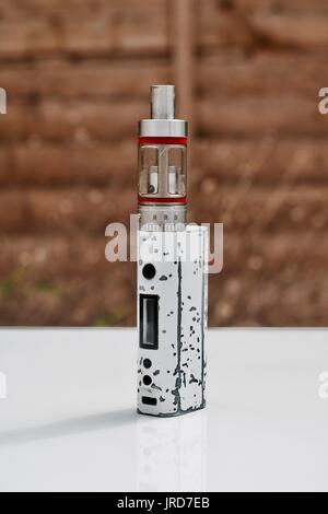 Container with vaping liquid for electronic smoking device isolated on ...