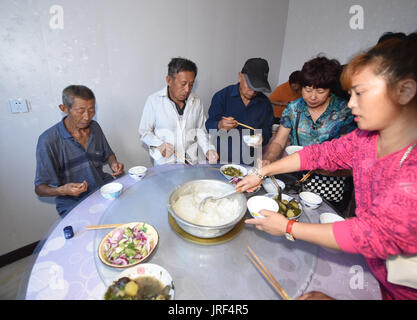 Xiuyan, China's Liaoning Province. 4th Aug, 2017. Firefighters rescue a ...