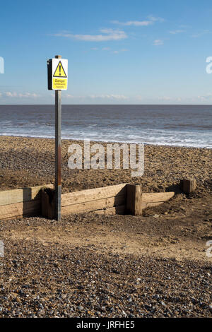 Danger underwater hazards sign on Southwold beach Stock Photo - Alamy
