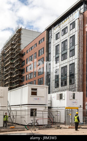 Cladding being installed on buildings, Cardiff, Wales, UK Stock Photo ...