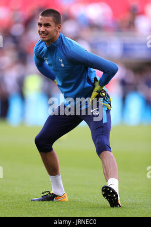 Tottenham Hotspur goalkeeper Alfie Whiteman (right) is replaced by Luca ...