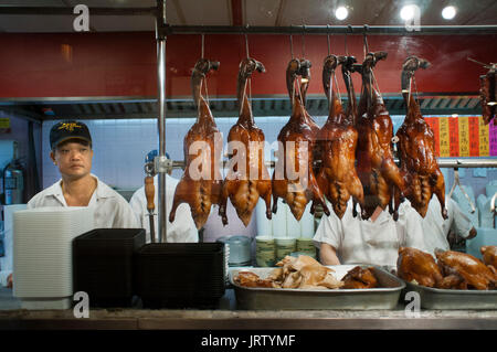 Peking Ducks on Display in Chinatown. Typical Asian food restaurant in ...