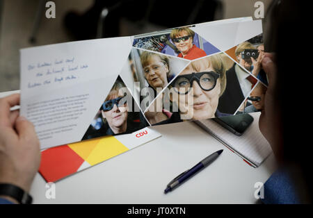 Large poster of the CDU German Chancellor Angela Merkel, with a typical ...