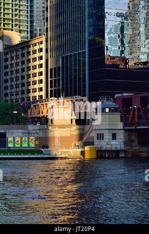 A Chicago CTA Pink Line train streaks across the Chicago River on the ...